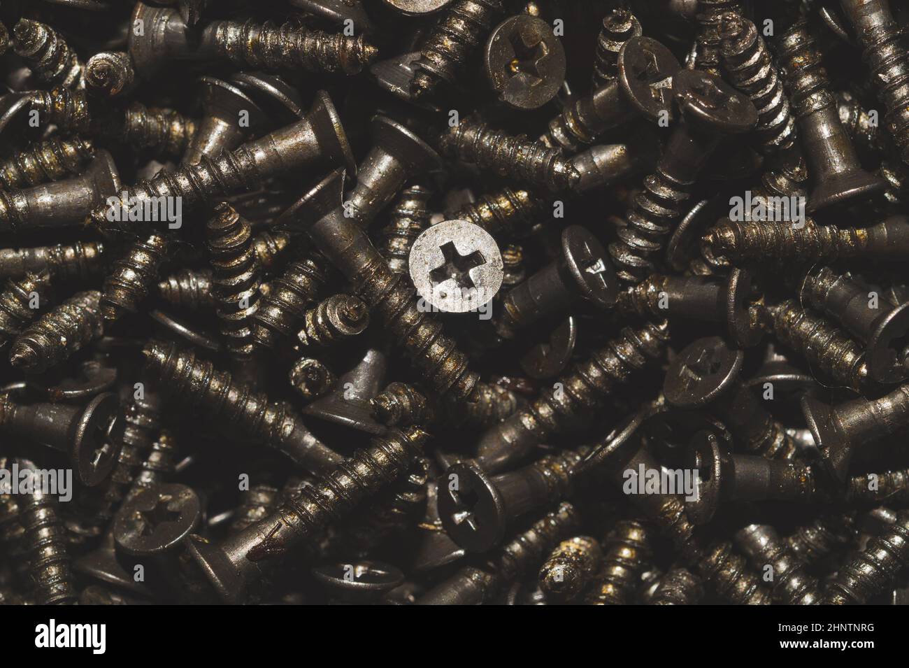 Screws background. heap of tapping screws. work tool. pile of fasteners ...