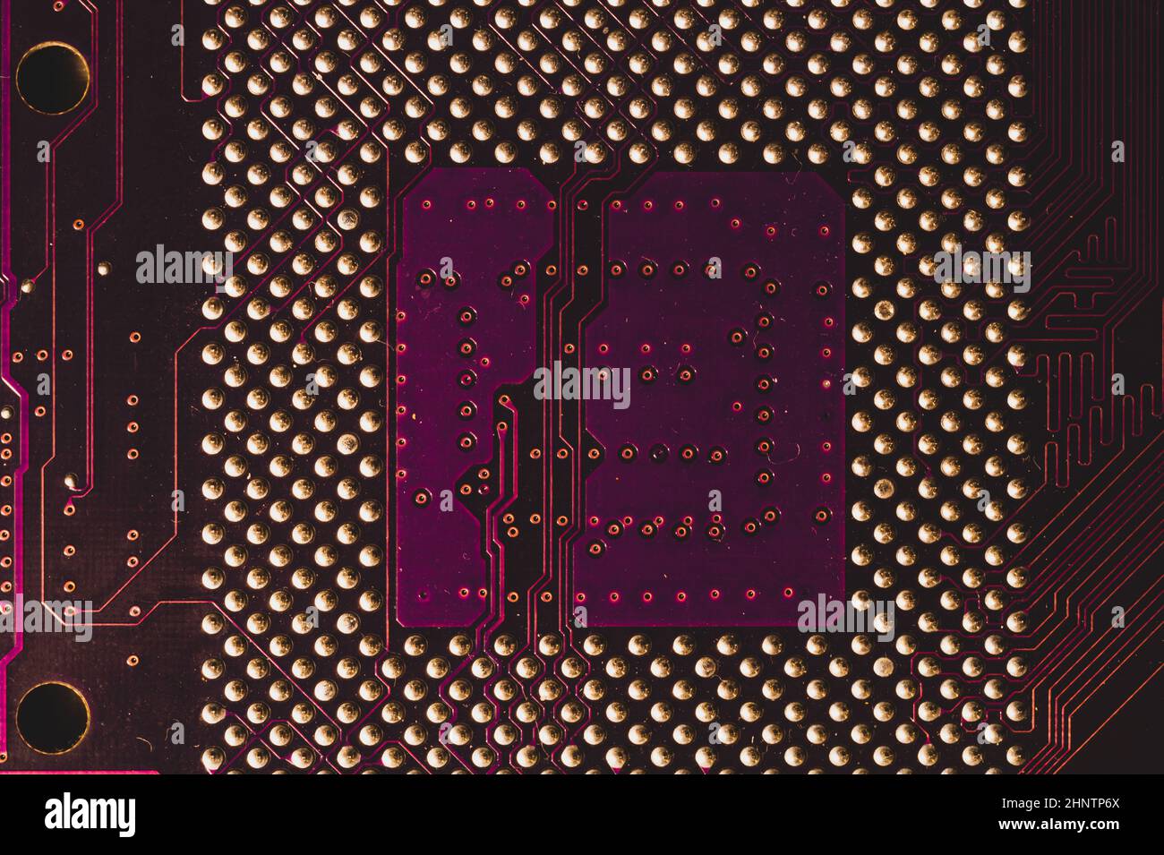 Processor pins macro. computer motherboard close up. cpu pins on a circuit board. micro elements ...