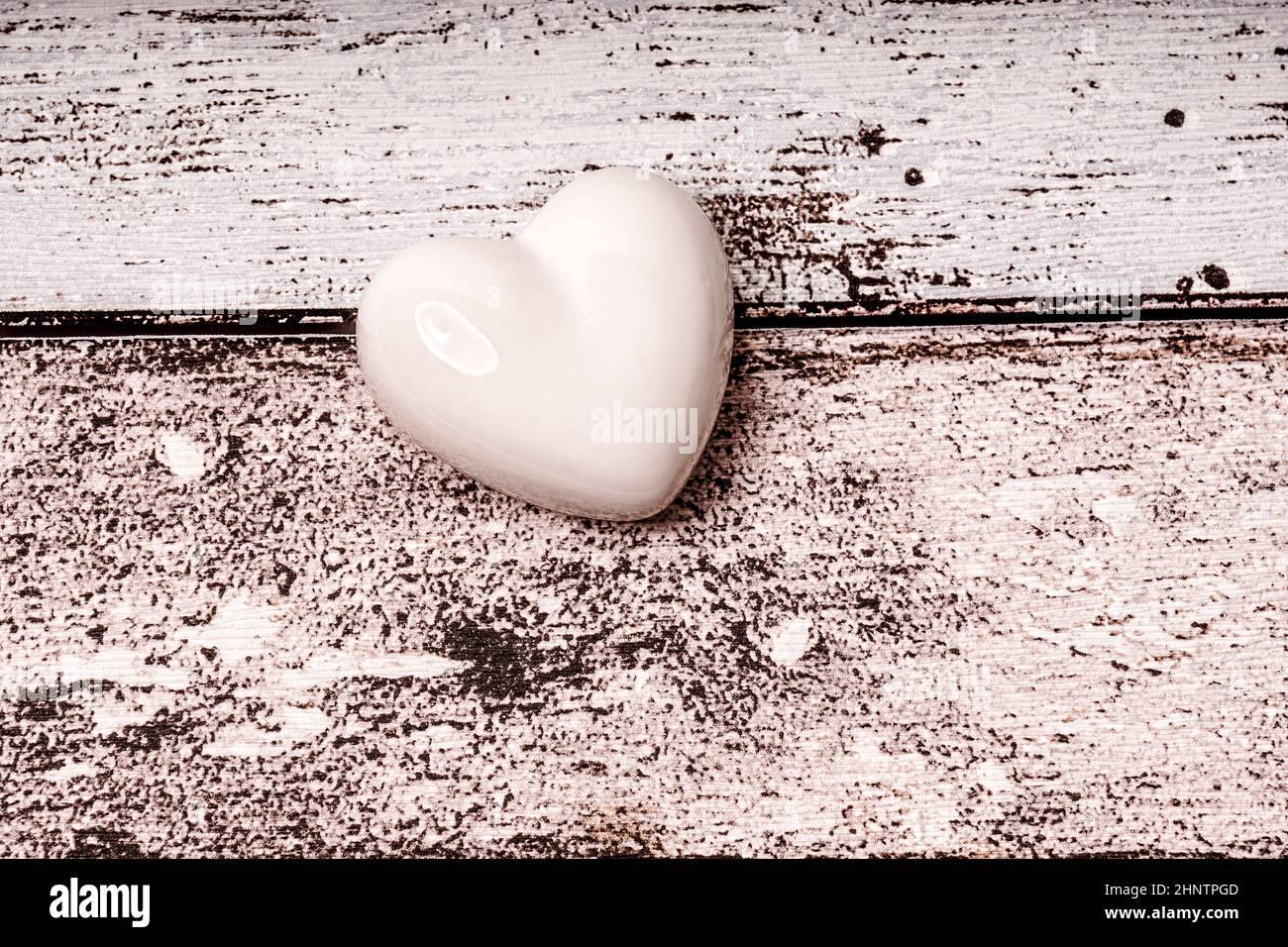 White heart as a symbol of love Stock Photo - Alamy