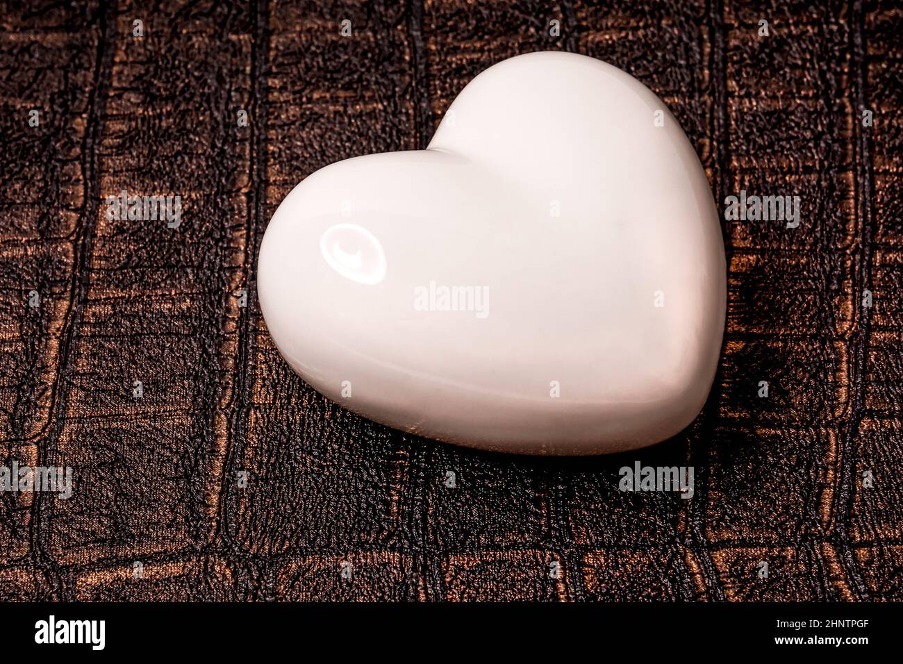 White heart as a symbol of love Stock Photo - Alamy