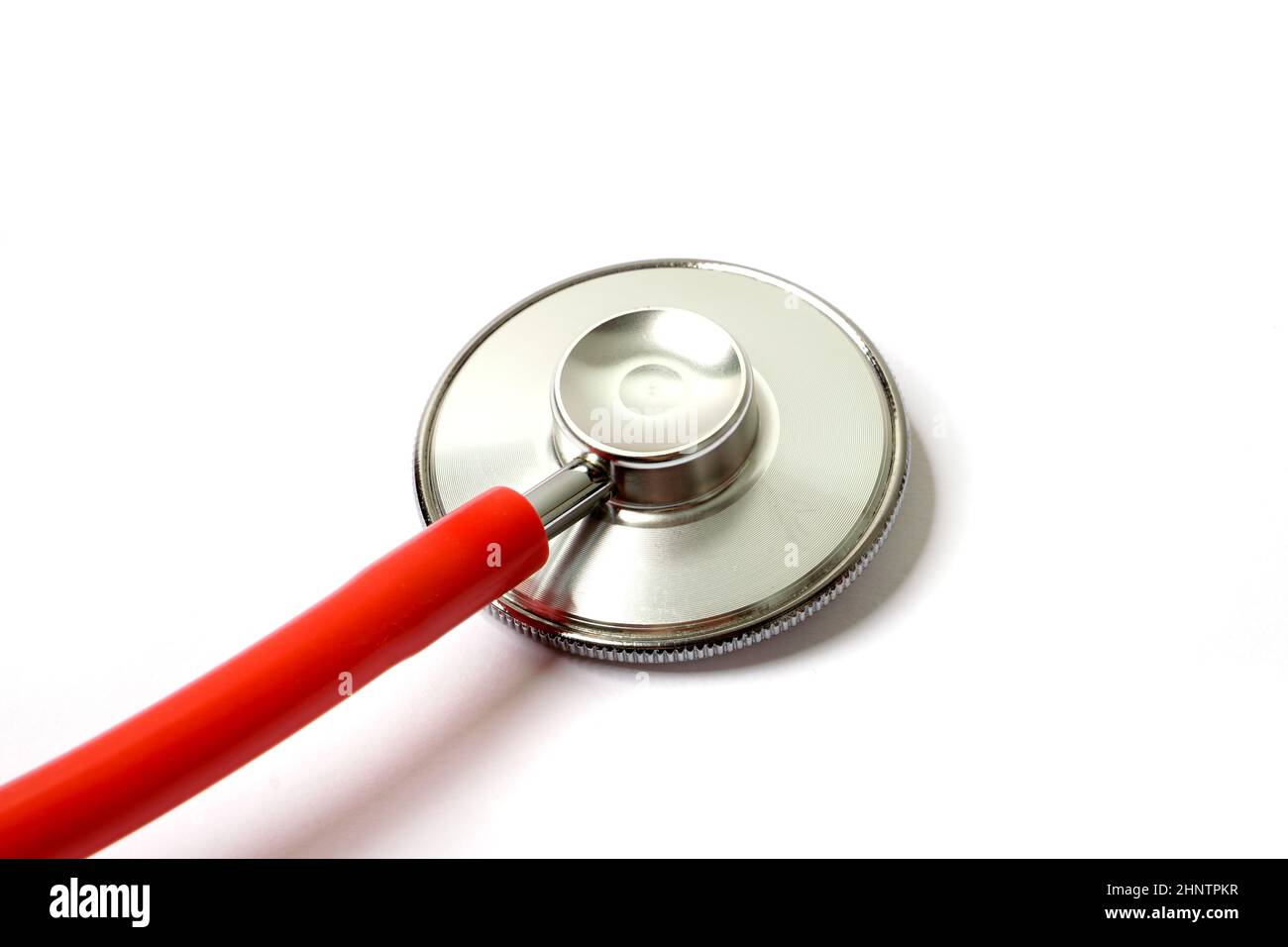 Red stethoscope, close up and still life of a modern stethoscope for ...
