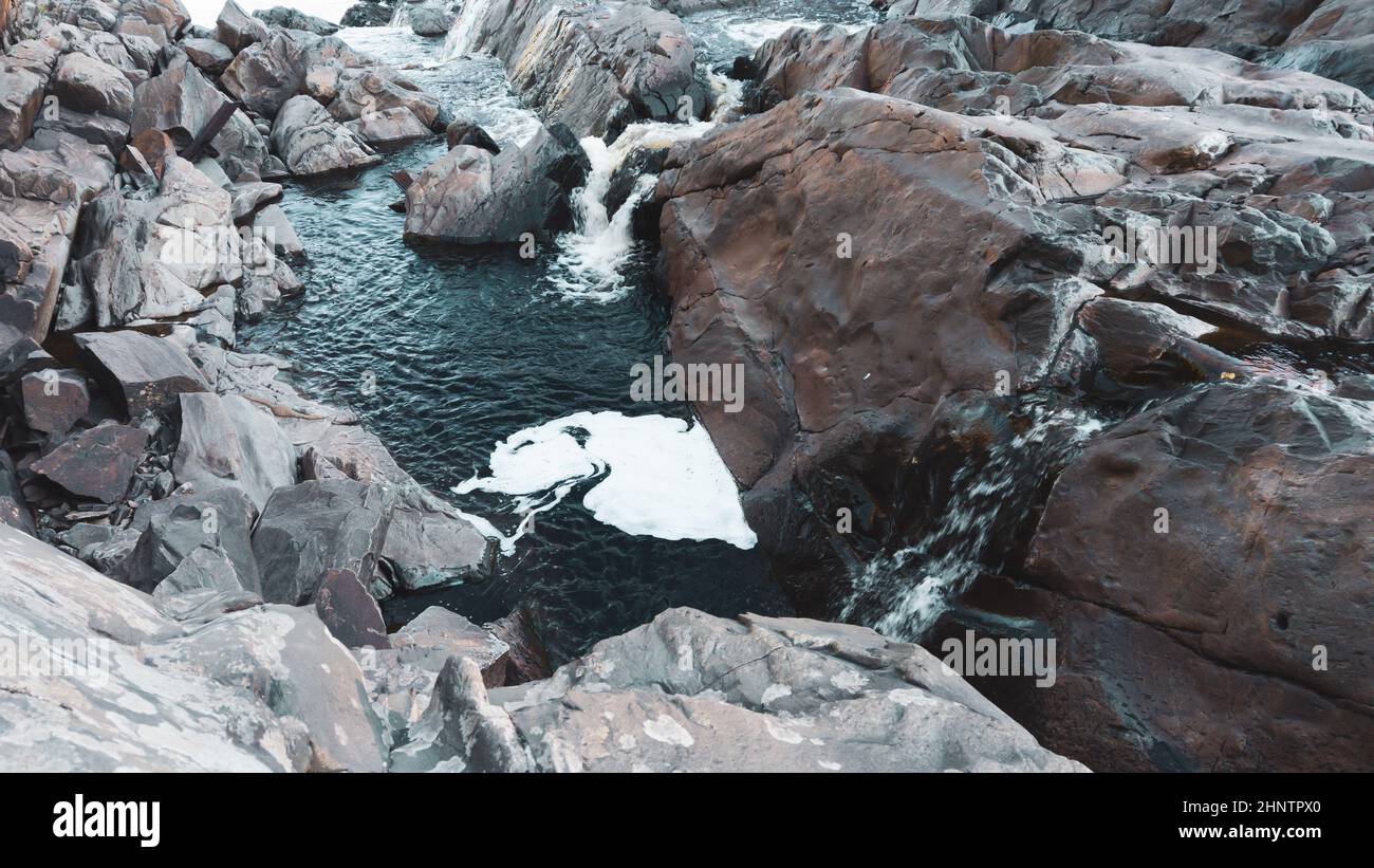River flows among the rocks. water streaming between the stones Stock ...