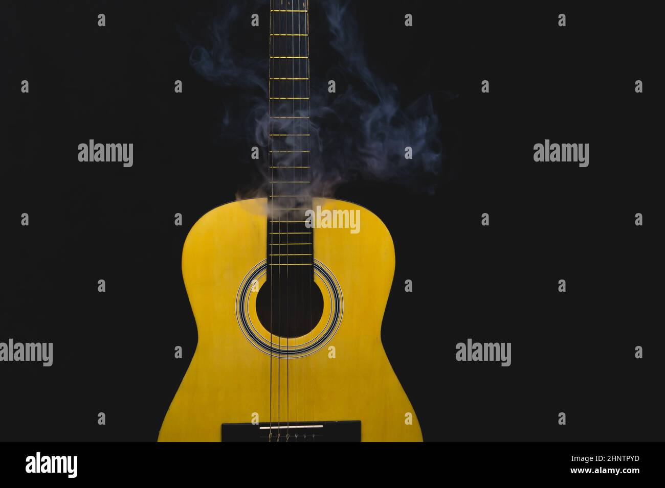 Guitar in smoke close up. musical instrument. strings on the guitar ...