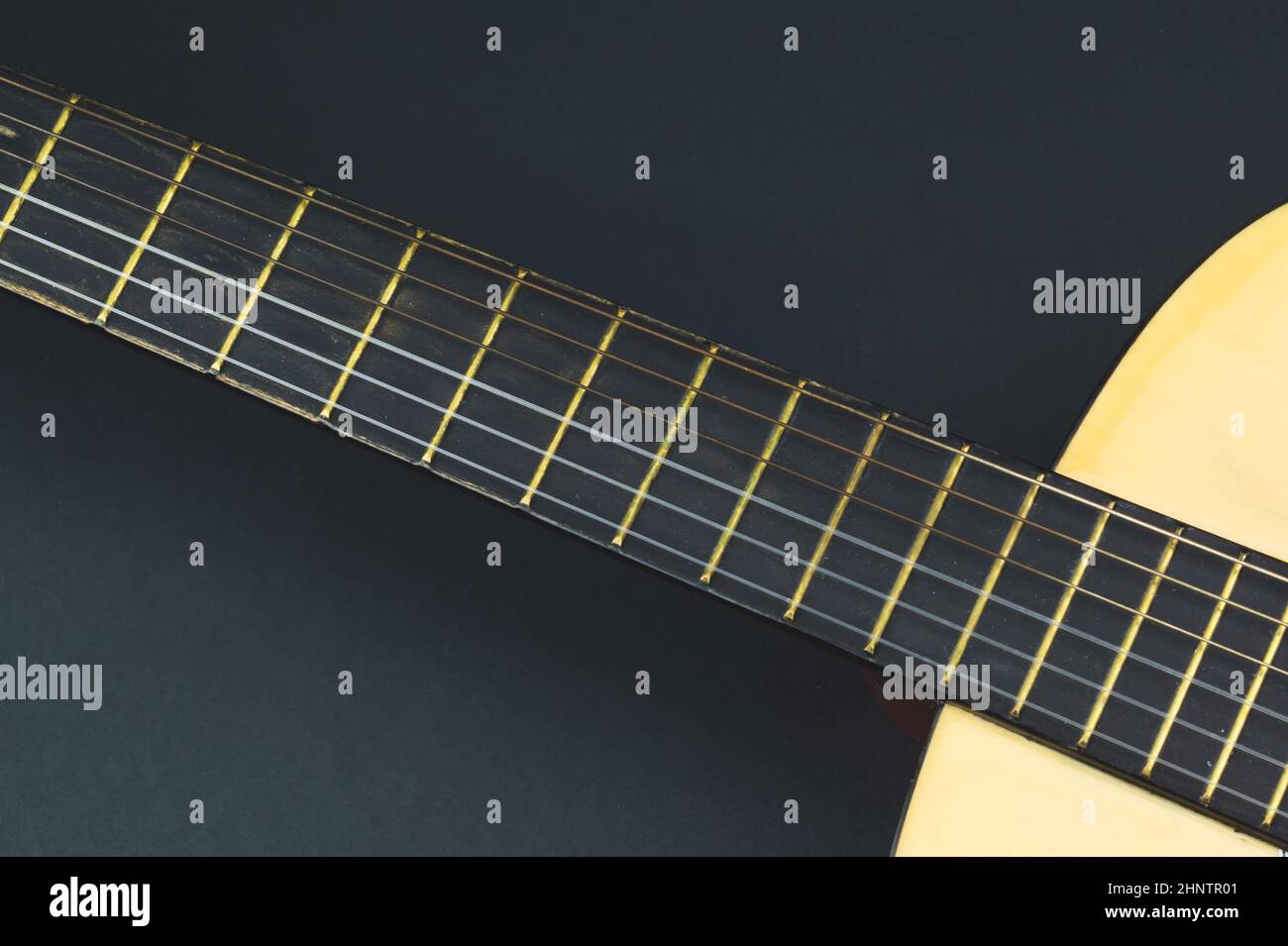 Guitar close up. musical instrument. strings on the guitar fretboard ...