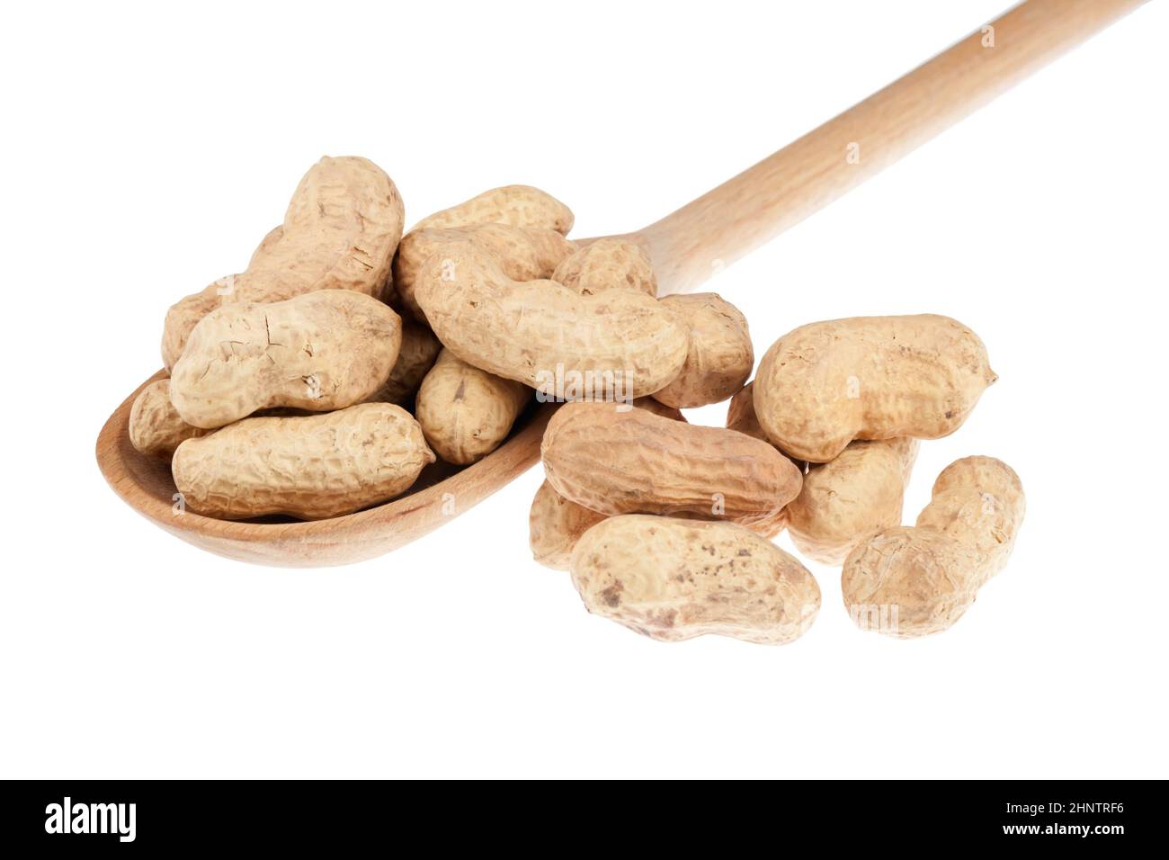 Wooden spoon with peanut isolated on white background Stock Photo - Alamy