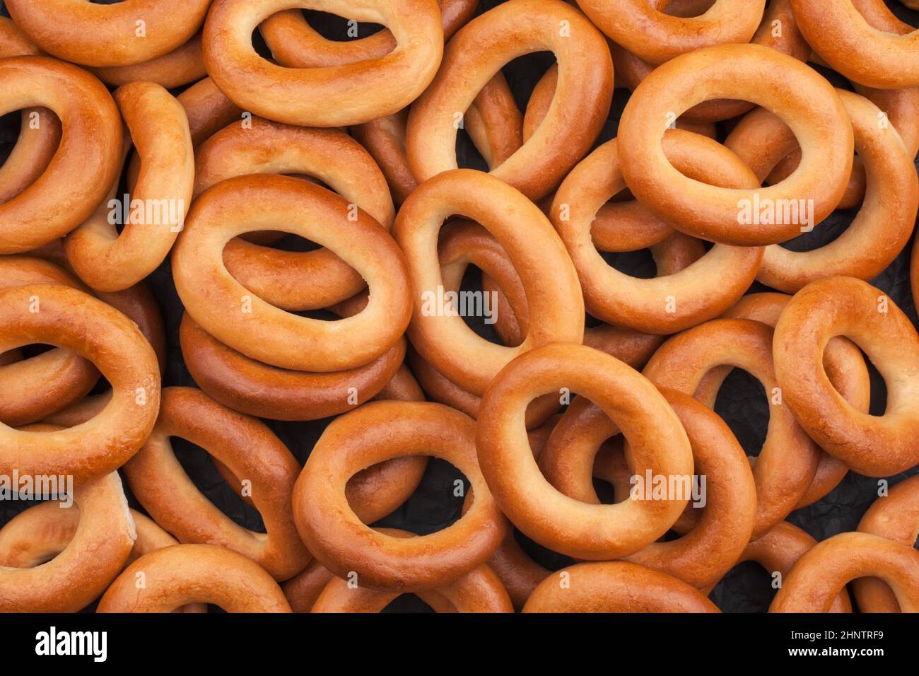 Oval bagels can be used as background Stock Photo - Alamy