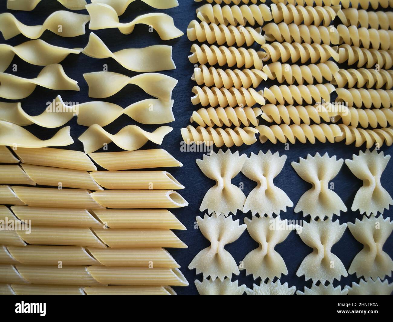The texture of four types of pasta: tagliatelle, farfalle, penne and ...