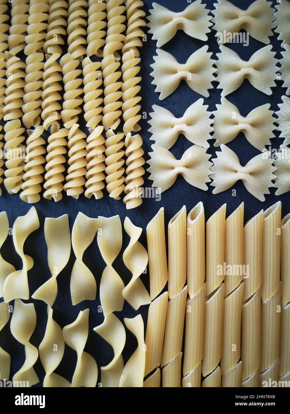 The texture of four types of pasta: tagliatelle, farfalle, penne and ...