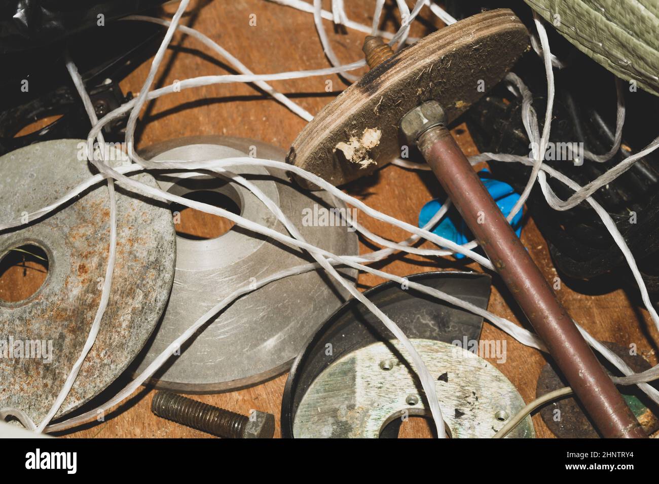 Various old rusty tools in the box. chaos of working things in workshop ...
