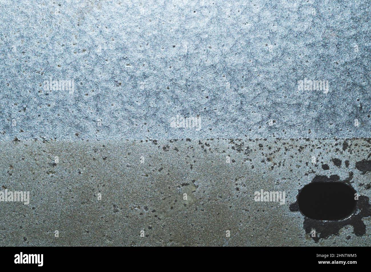 Iron plate macro. metal sheet with hole. steel background close up ...