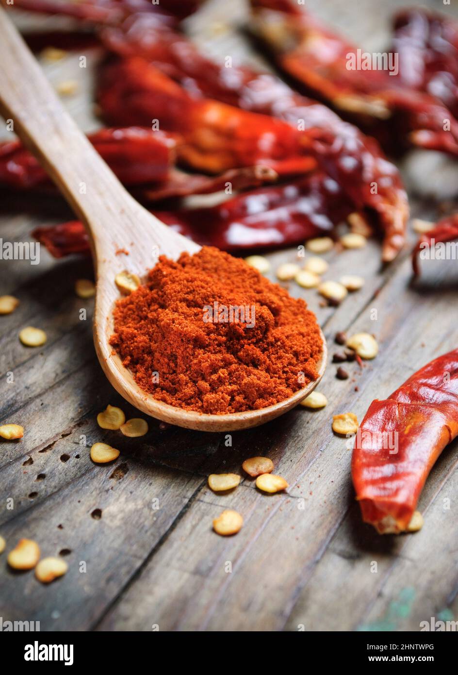 Chilli peppers on rustock wooden plank Stock Photo - Alamy