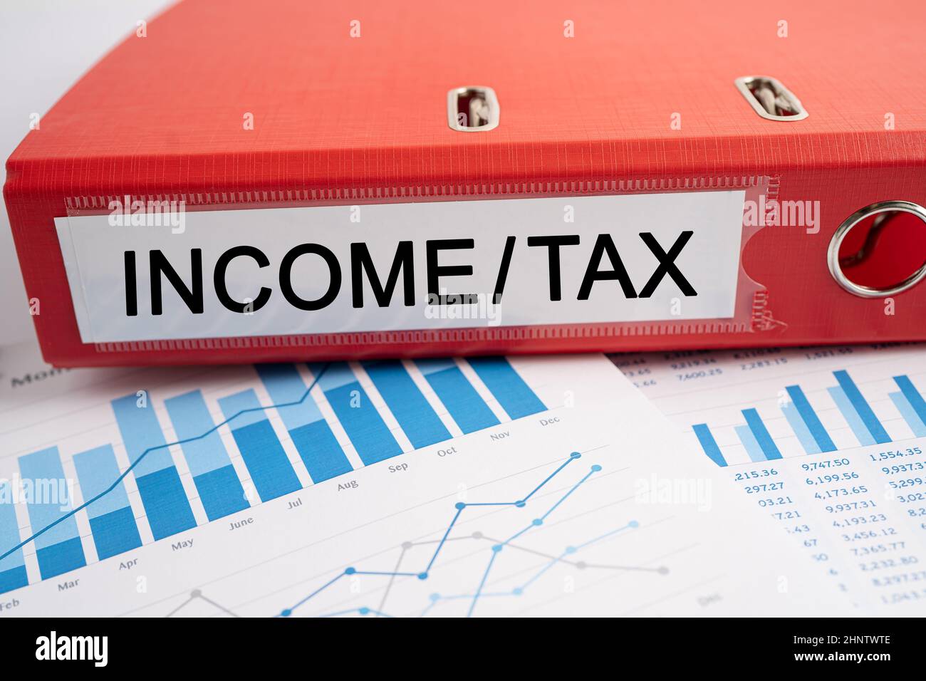 Income Tax. Binder data finance report business with graph analysis in ...
