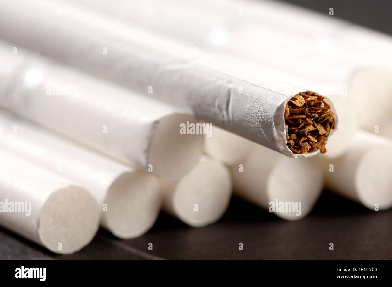 different types of cigarettes on a white background Stock Photo - Alamy