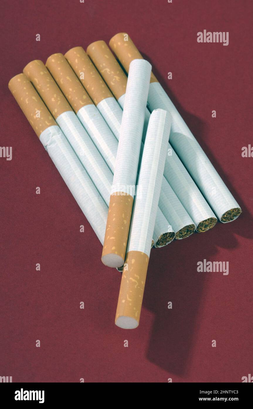 different types of cigarettes on a white background Stock Photo - Alamy