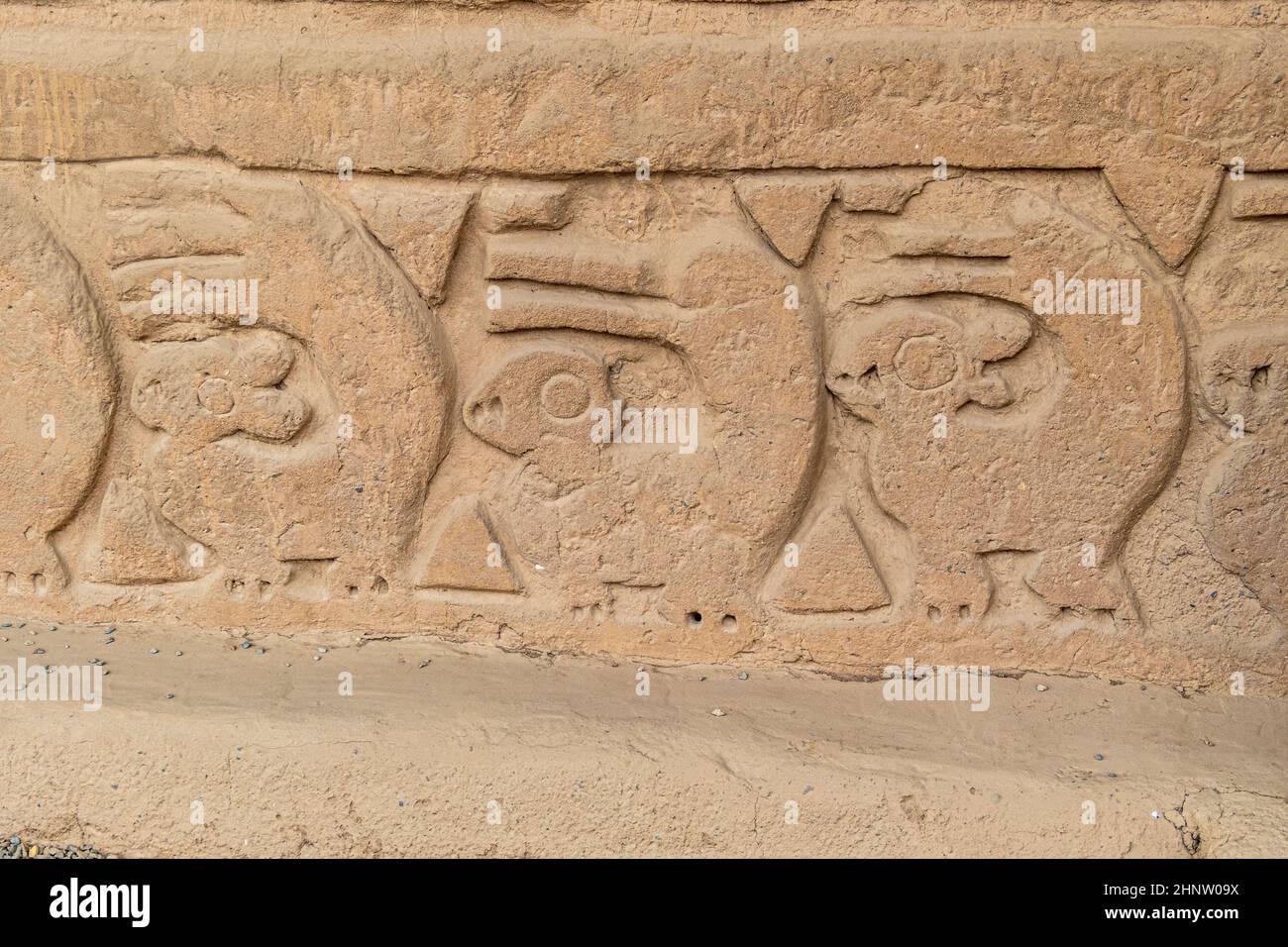 Panorama of the adobe walls and decorations in the archaeological site ...