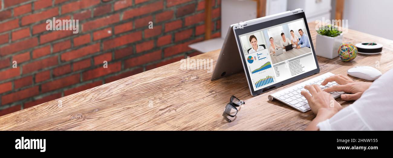 Virtual Conference Meeting In Office Room On Hybrid Convertible Laptop ...