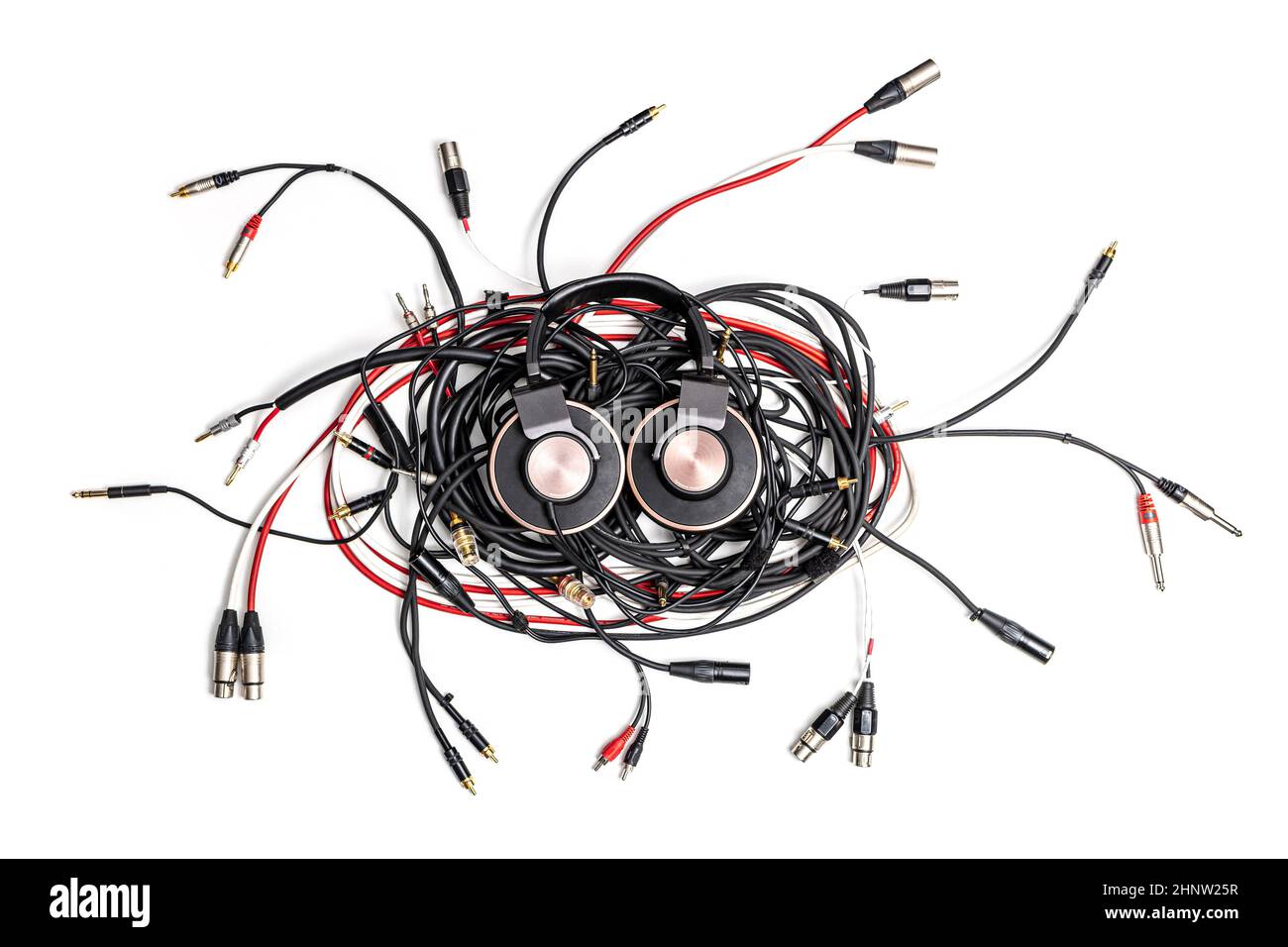 set of audio cables of different types and professional headphone on ...