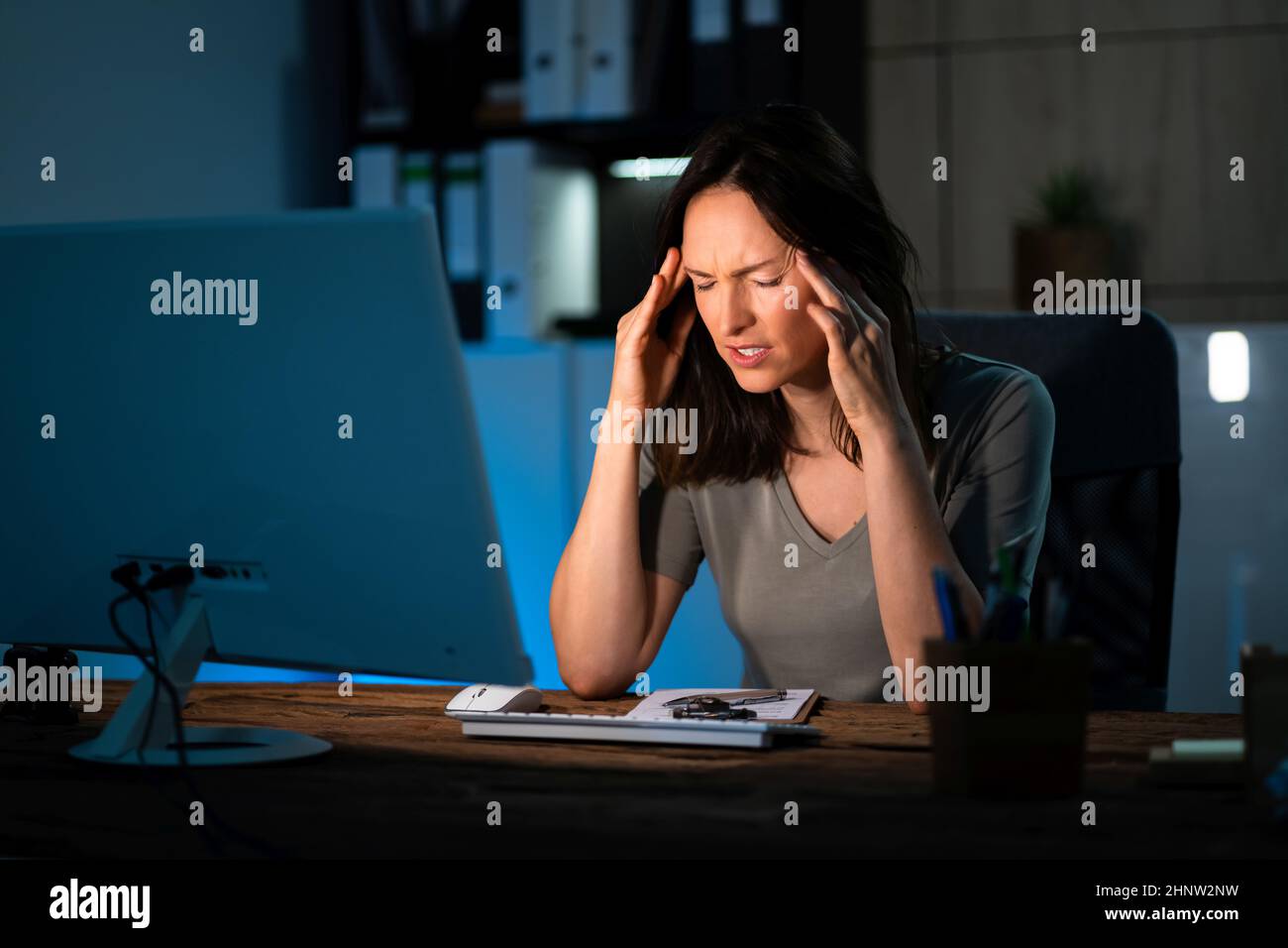 Bored Stressed Accountant Working Late In Office Stock Photo - Alamy