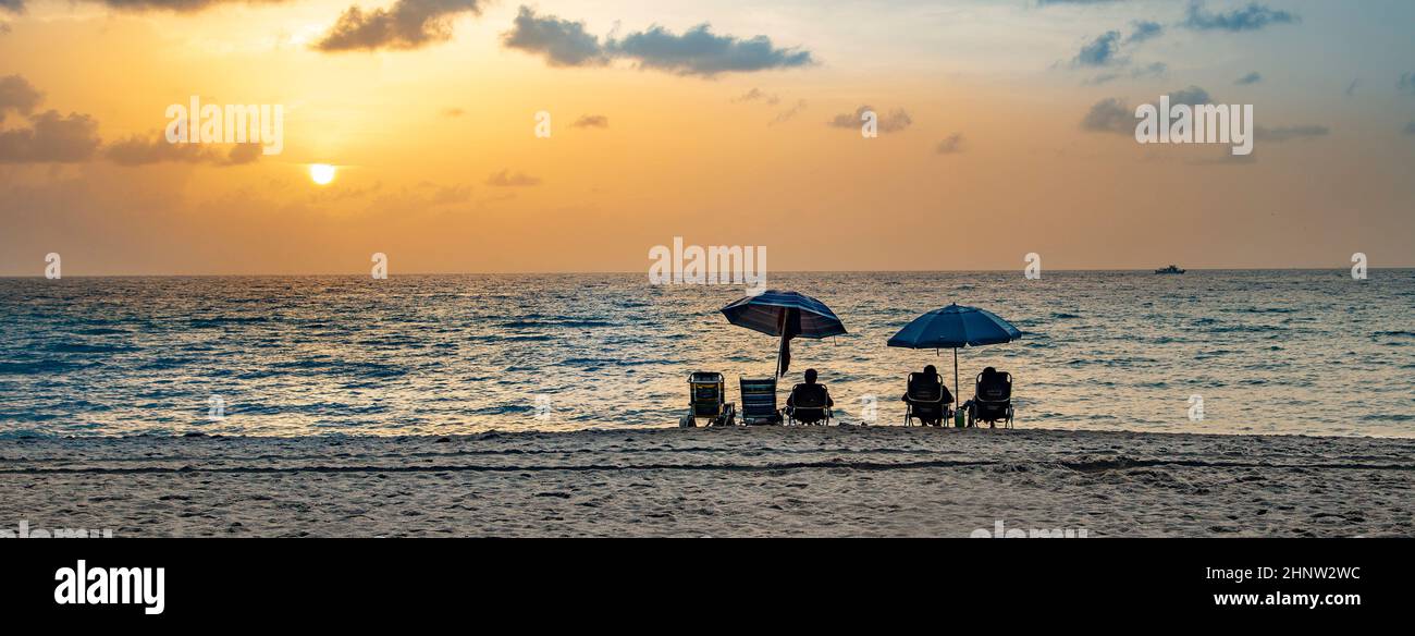 people enjoy the sunset at south beach, Miami Stock Photo - Alamy