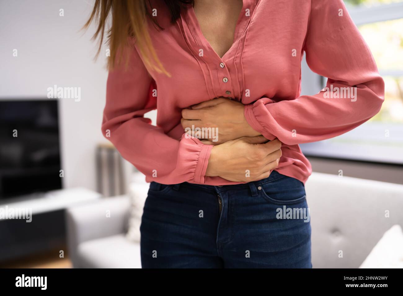 Sick Woman With Abdominal Pain And PMS Period Stock Photo - Alamy