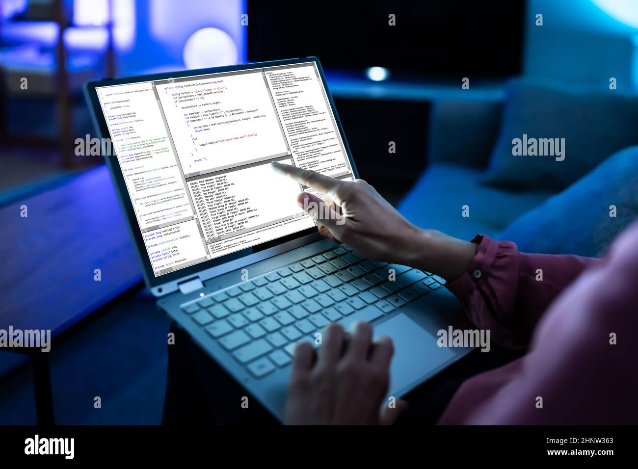 Computer Programmer Using Development Software On Laptop Stock Photo ...