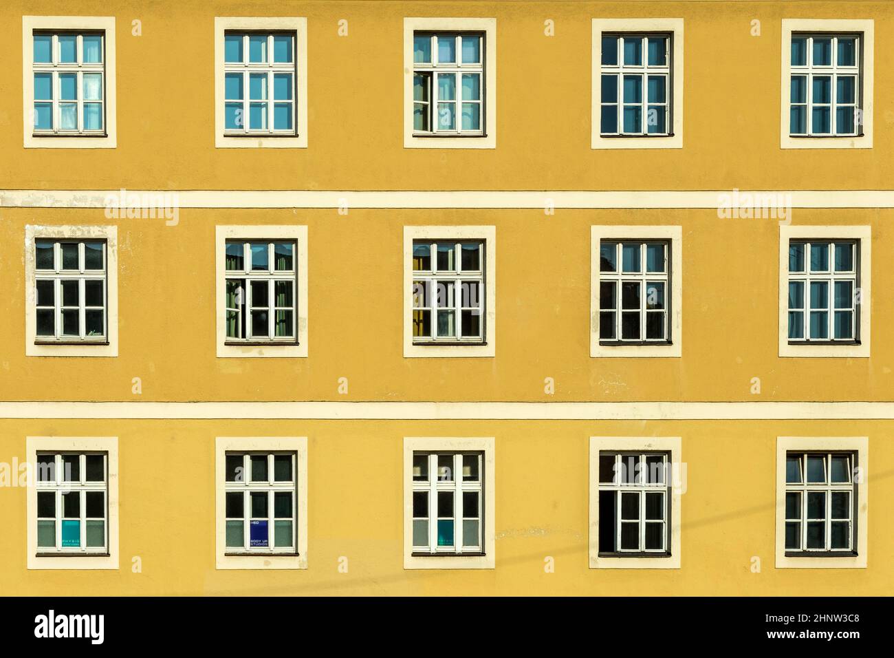 house wall with old vintage windows with cross structure as harmonic ...