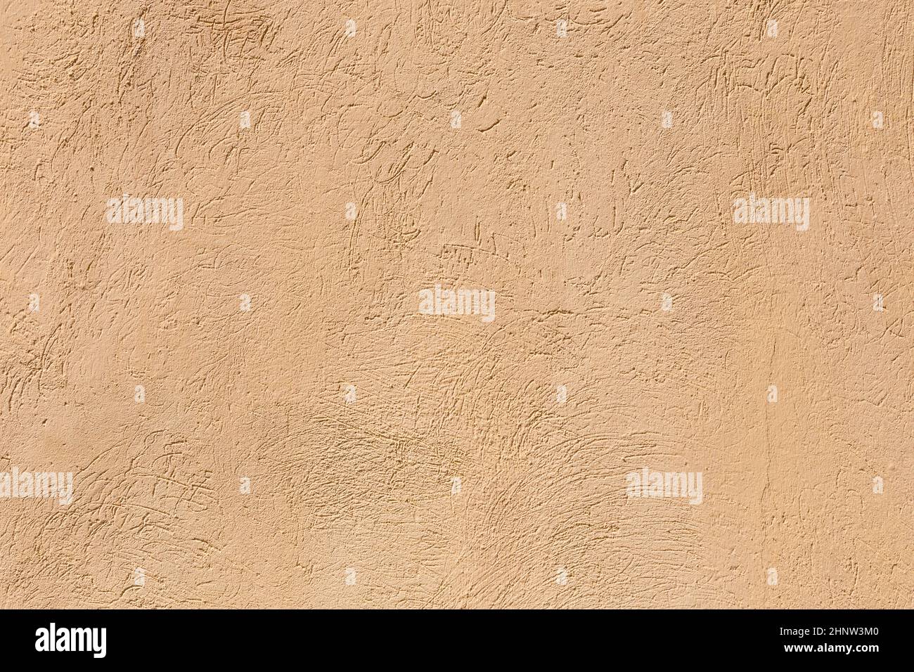 pattern of ochre painted rough house wall Stock Photo - Alamy
