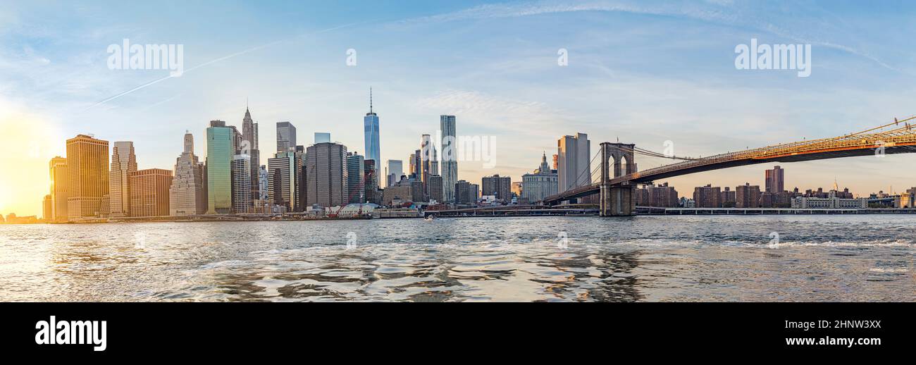Manhattan Downtown urban view with Brooklyn bridge in sunset Stock Photo - Alamy