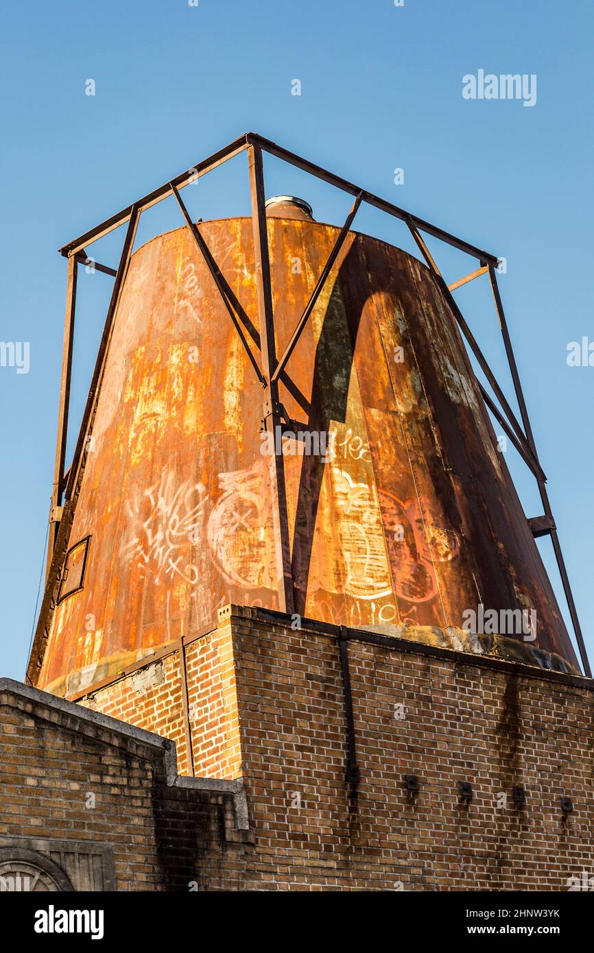 old rusty dirty water tank in New York Stock Photo - Alamy
