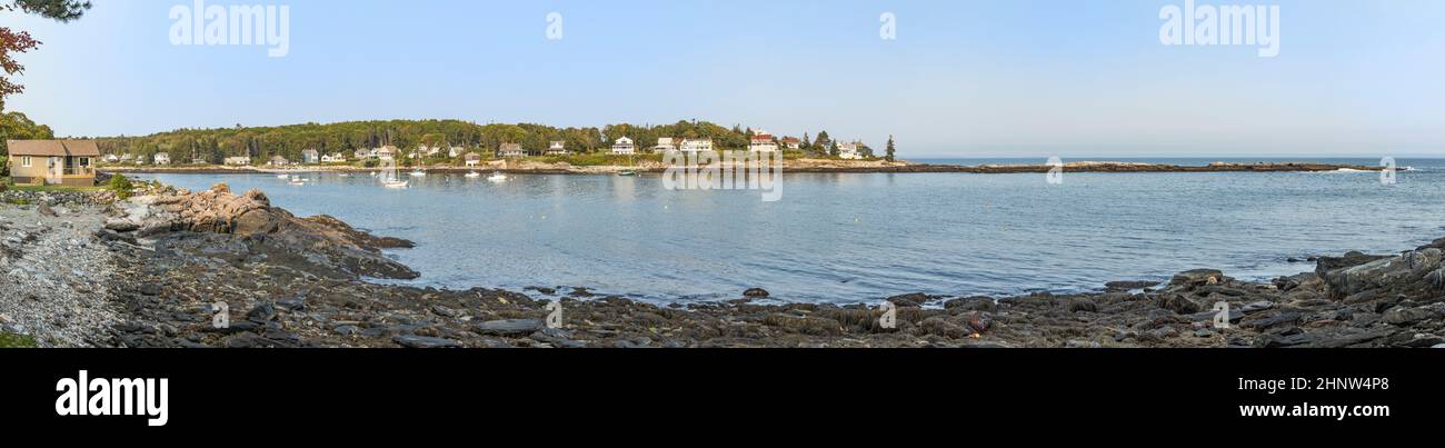 scenic empty coast with boats and wooden houses in Bristol Stock Photo ...