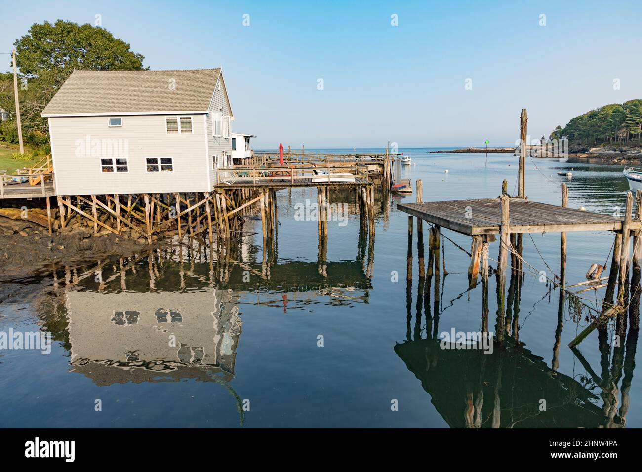 scenic empty coast with boats and wooden houses in Bristol Stock Photo ...