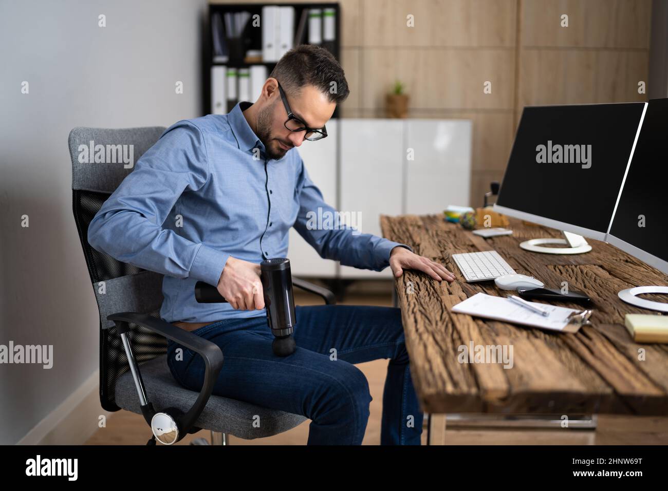 Massage Gun Machine Recovery Therapy And Stimulation Stock Photo - Alamy