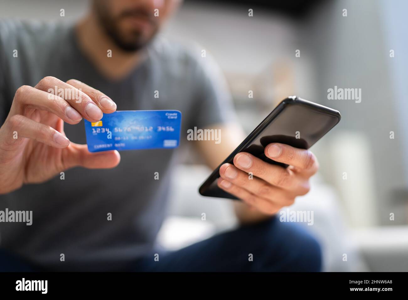 Online Shopping Payment On Mobile Phone Using Credit Card Stock Photo ...