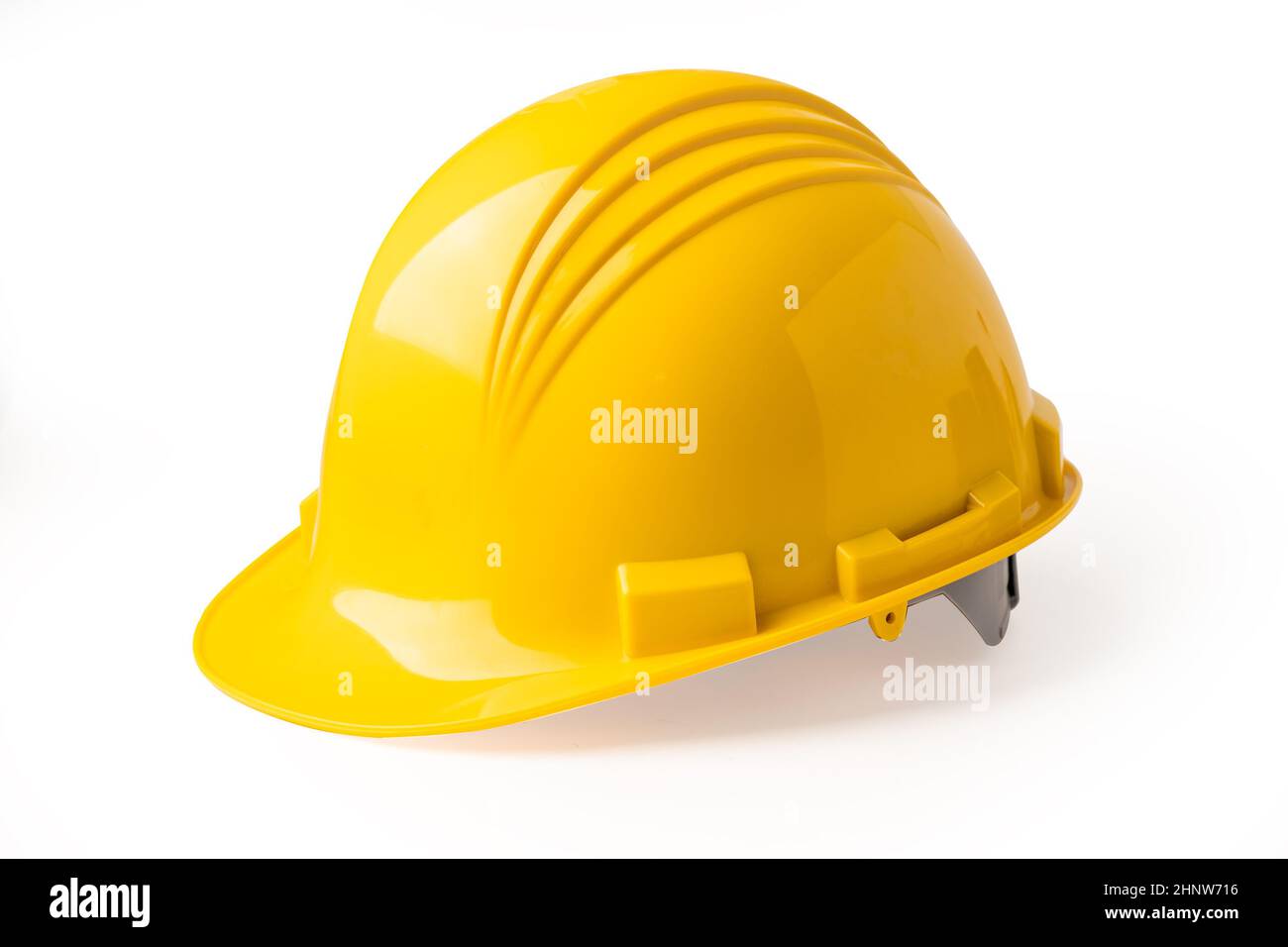 Yellow construction helmet isolated on white background with clipping ...