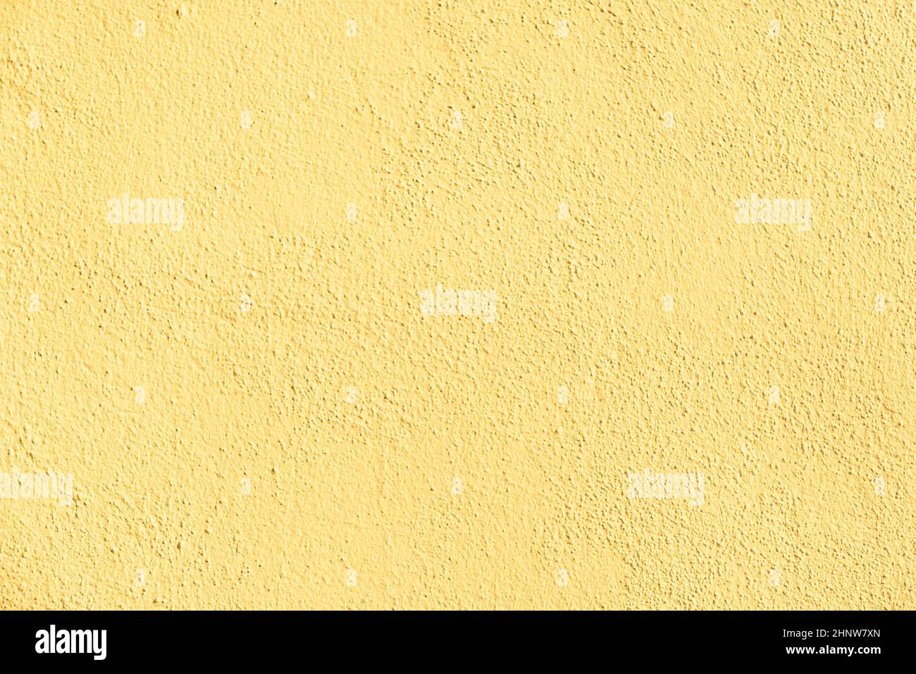 yellow rough plaster background of a wall Stock Photo - Alamy