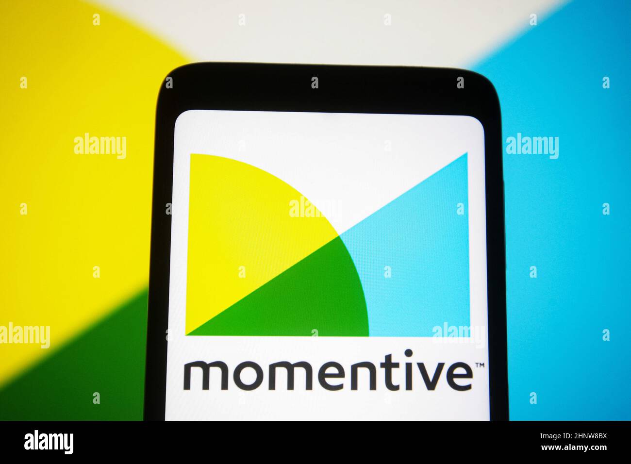 In this photo illustration, a Momentive Global Inc. logo is seen on a ...