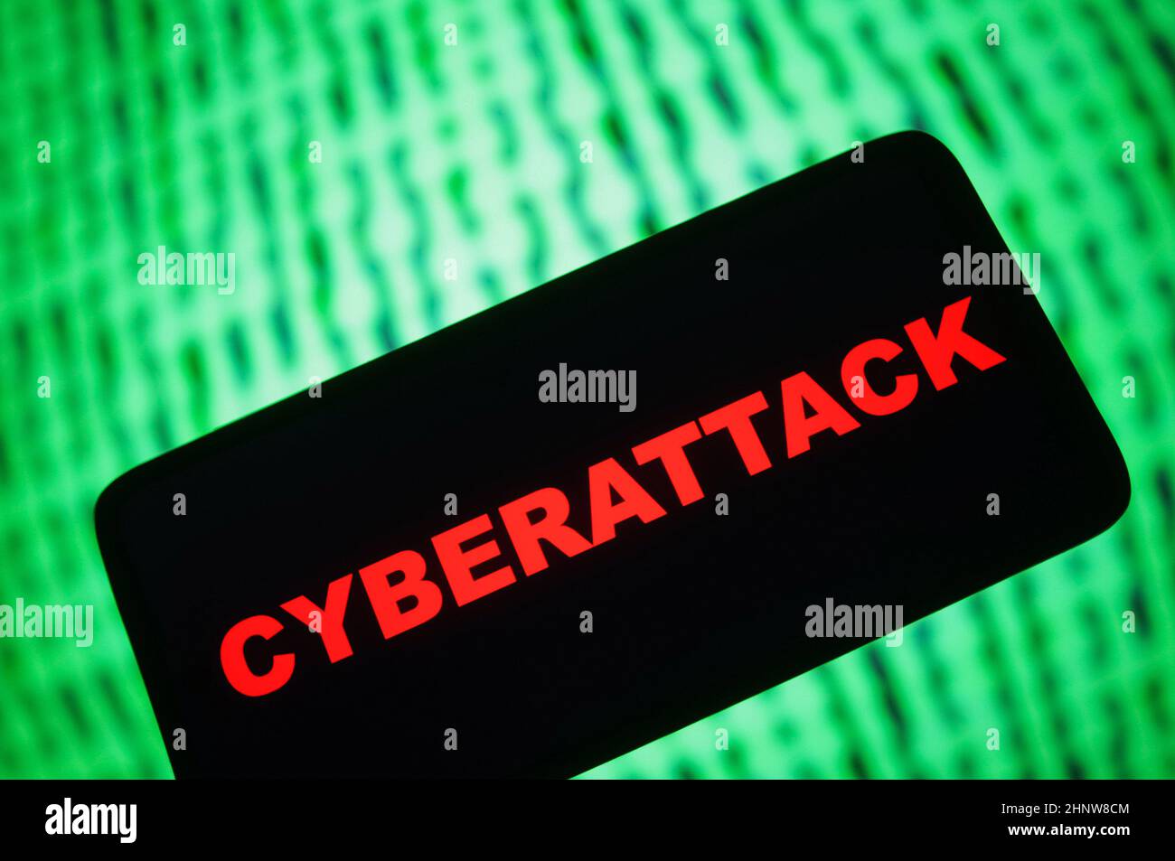 In this photo illustration, a Cyberattack word logo is seen on a ...