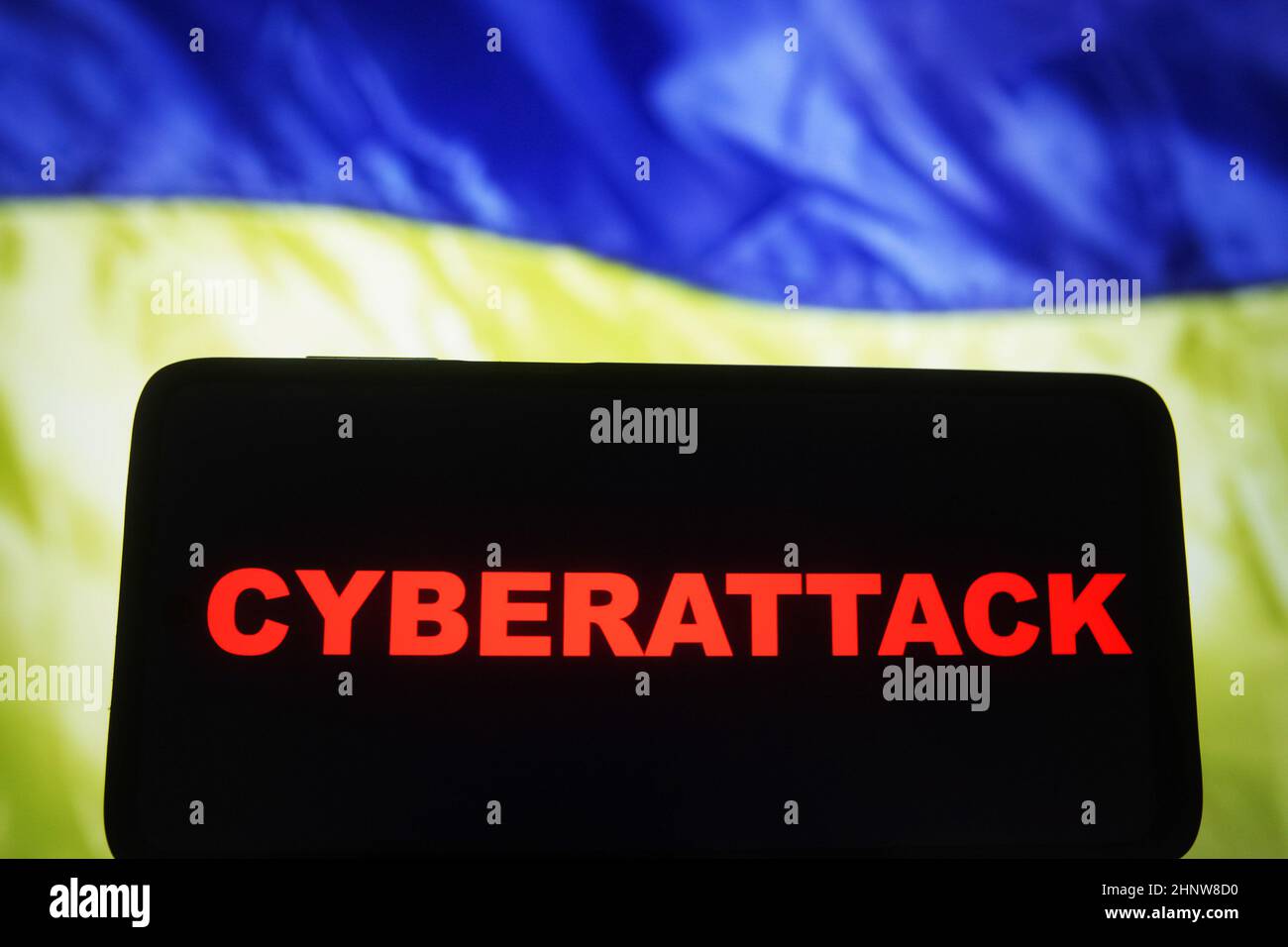 In this photo illustration, a Cyberattack word is seen on a smartphone ...