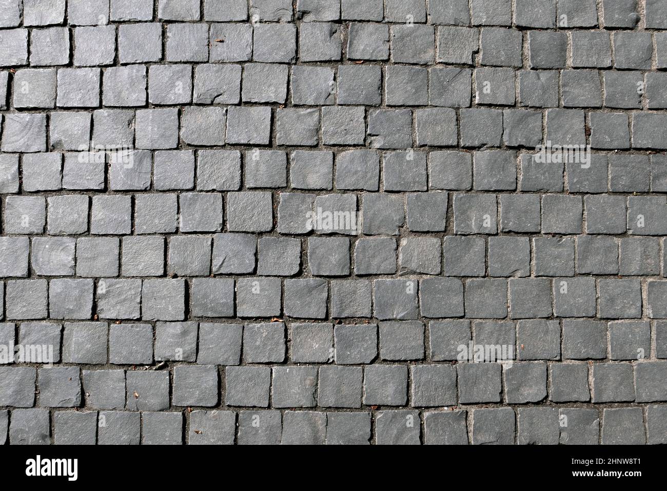 grey cobble stone background for a pedestrian way Stock Photo - Alamy
