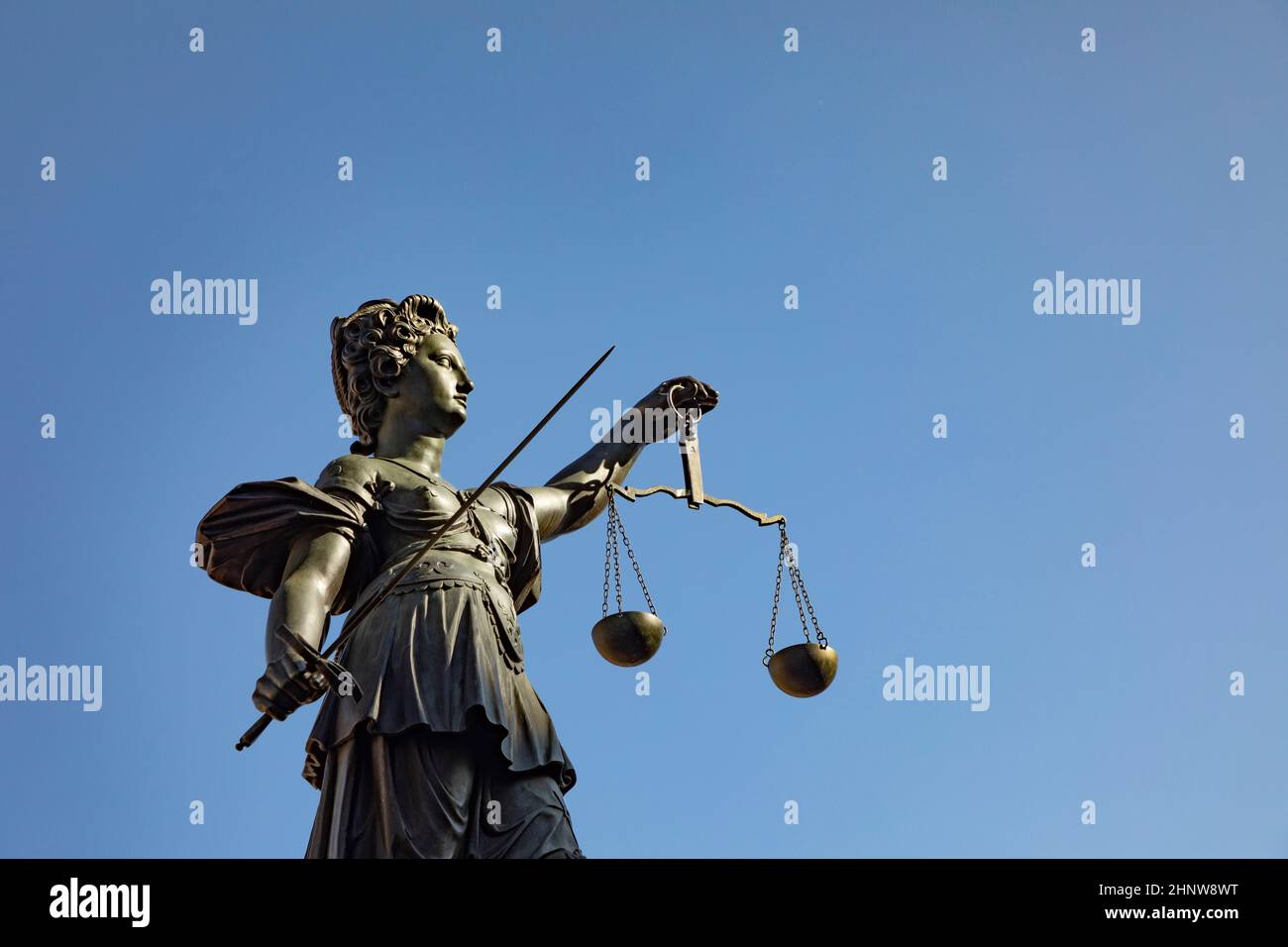 lady justice with sword and scale symbolizes justice Stock Photo - Alamy