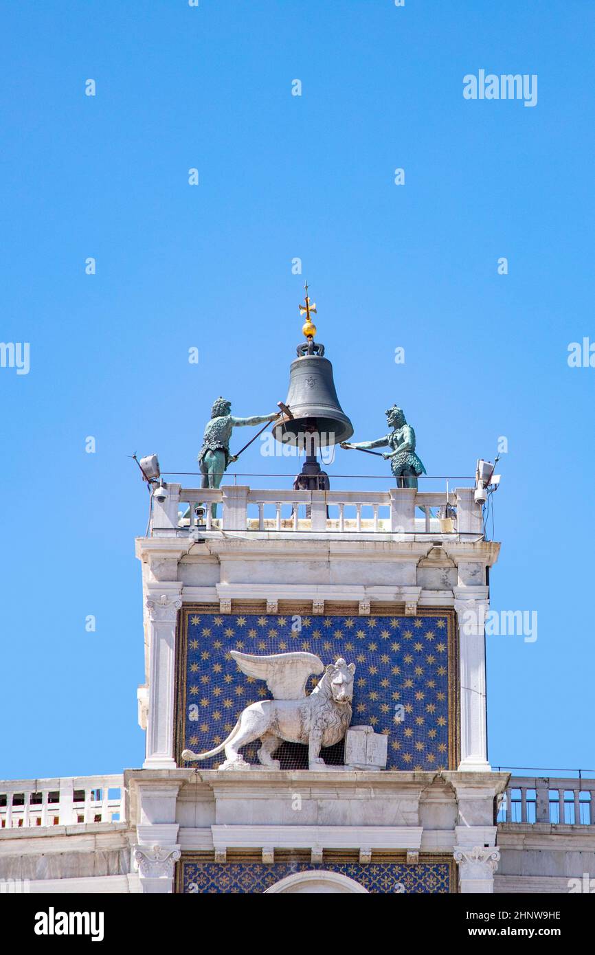 clock tower in Venice with hammering statues in Venice, Italy Stock ...
