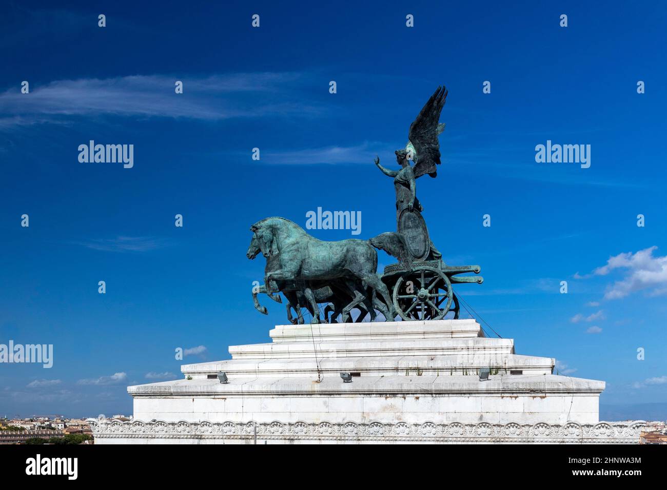 quadriga at Emmanuel II National Monument in Rome under blue sky Stock ...