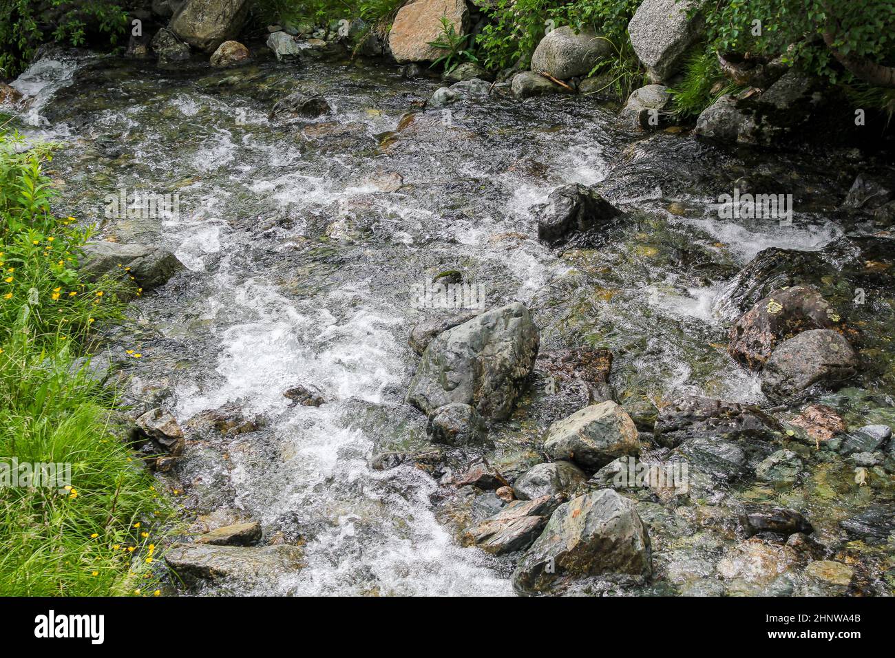 Flowing green river Lake Hemsila in Hemsedal, Viken, Buskerud, Norway ...