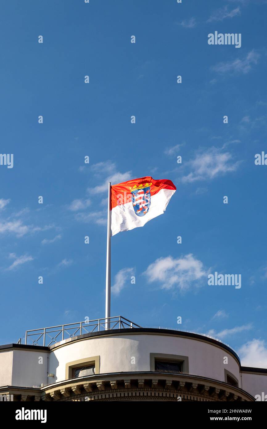 flag of Hesse under blue sky in Germany, Wiesbaden Stock Photo - Alamy