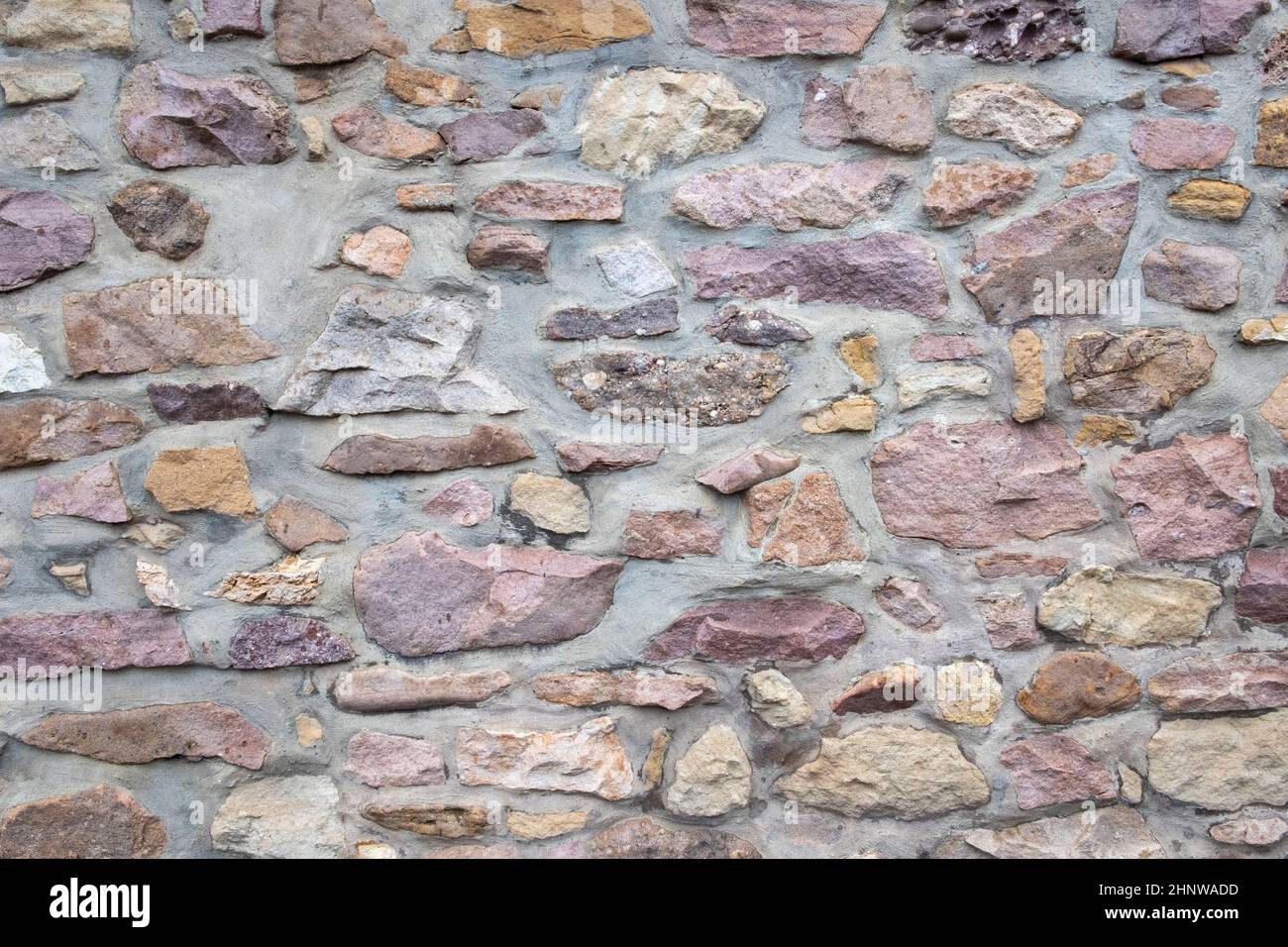 background of old stone wall in rough structure Stock Photo - Alamy