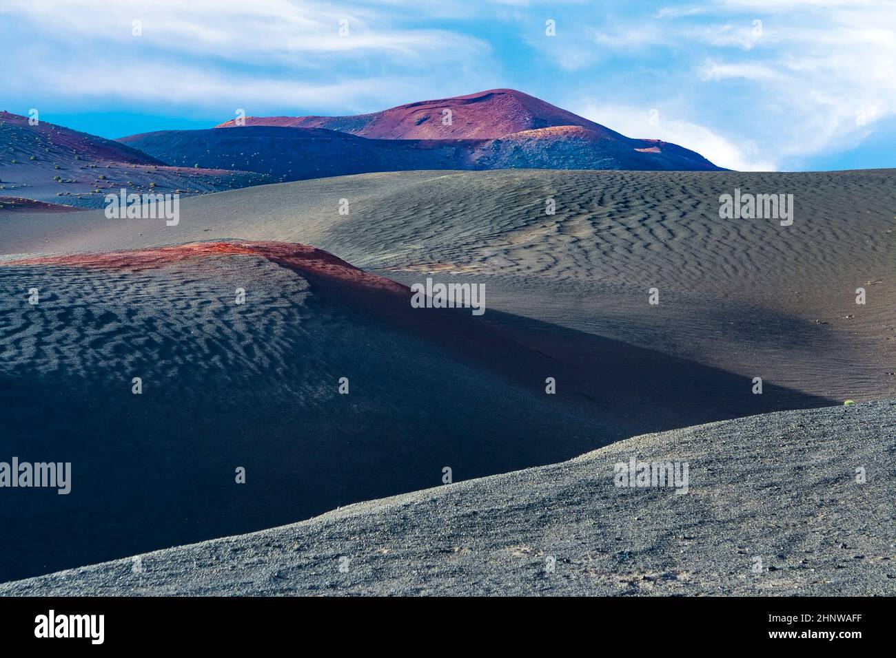 volcano landscape at sunset, national parc of Timanfaya in Lanzarote ...