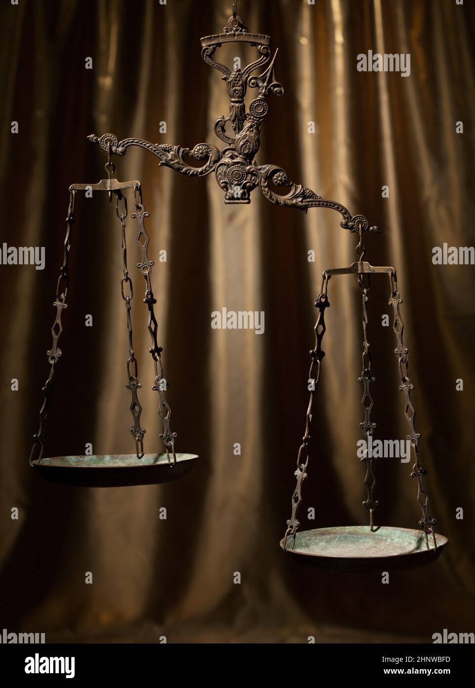 Antique rusty weighing scale on golden background Stock Photo - Alamy