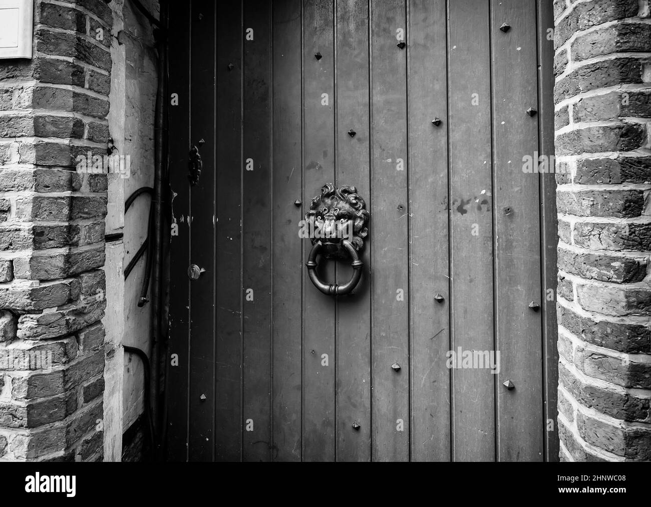Old wooden door with metal, medieval door detail, decoration and ...