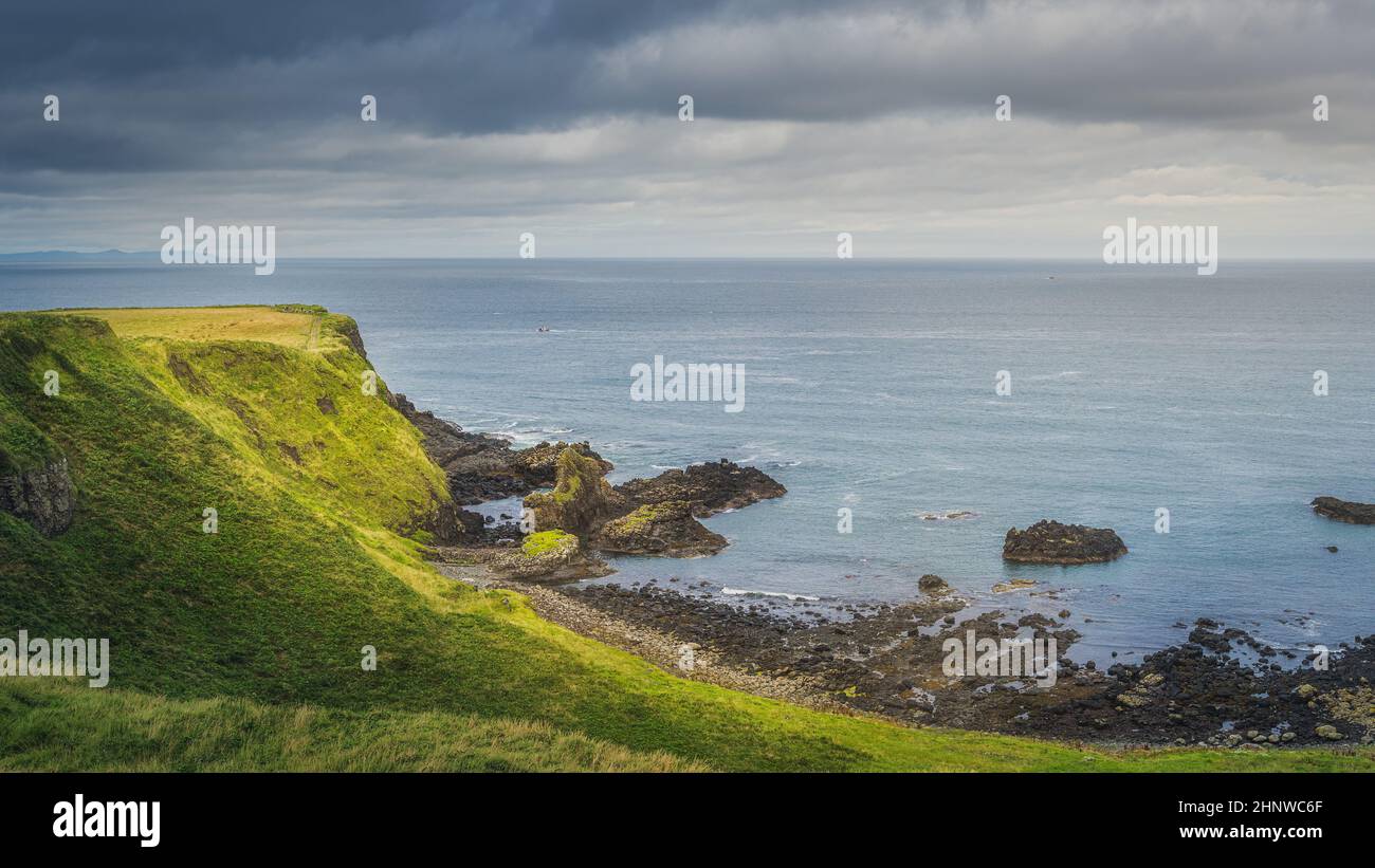Rock formations of Giants Causeway, seen from the top of the cliff ...