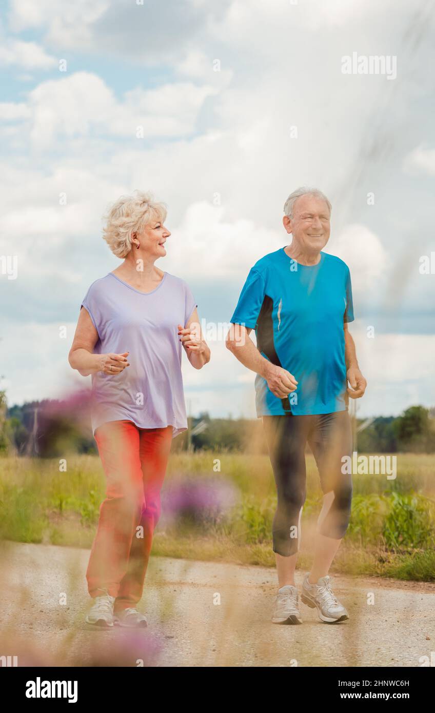 Couple jogging on rural hi-res stock photography and images - Alamy